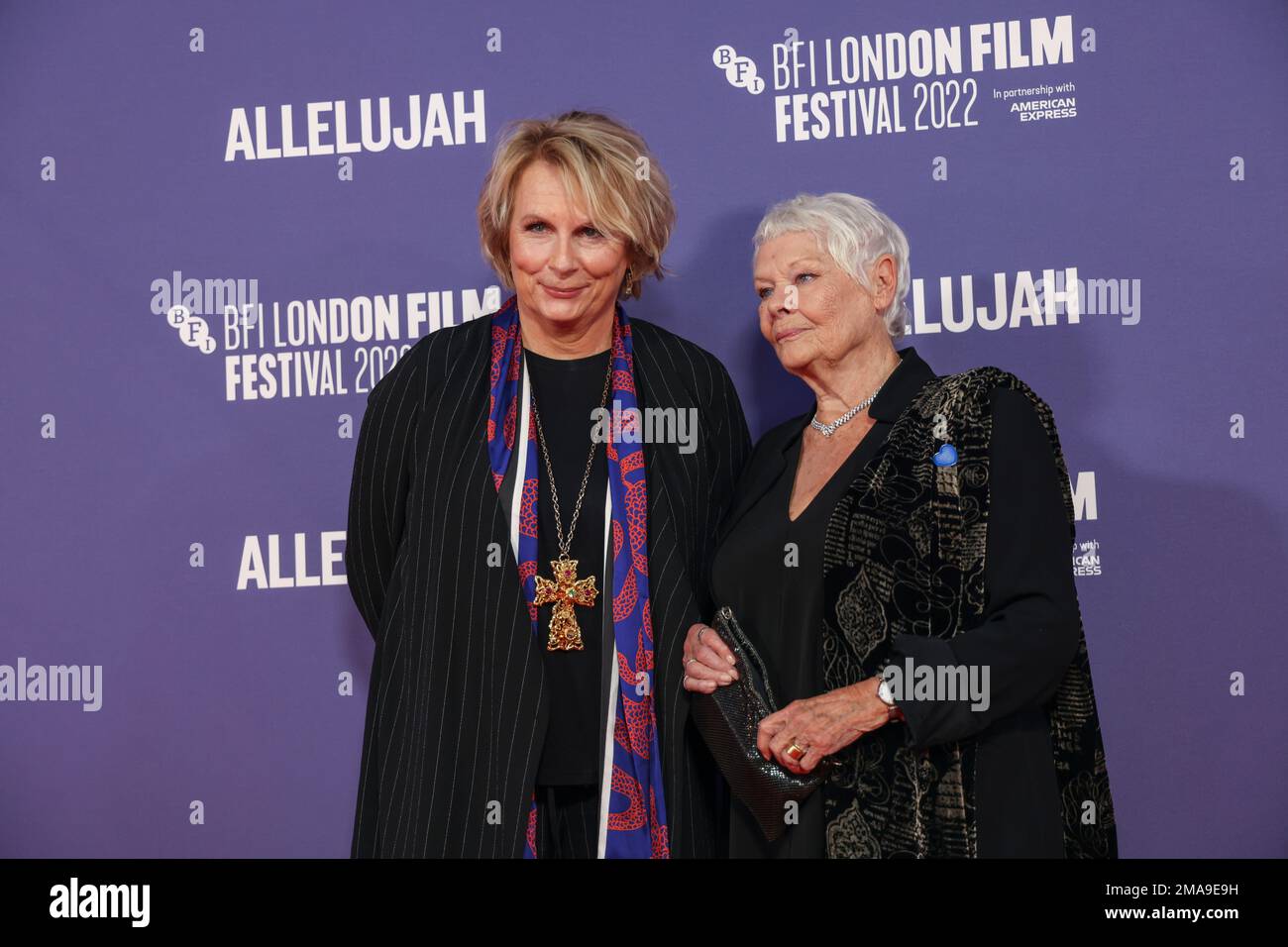 Jennifer Saunders, left, and Judi Dench pose for photographers upon ...
