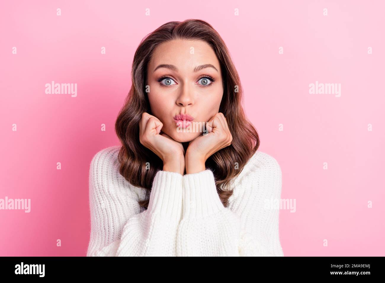 Photo of stunning person hands touch cheeks pouted lips kiss isolated ...