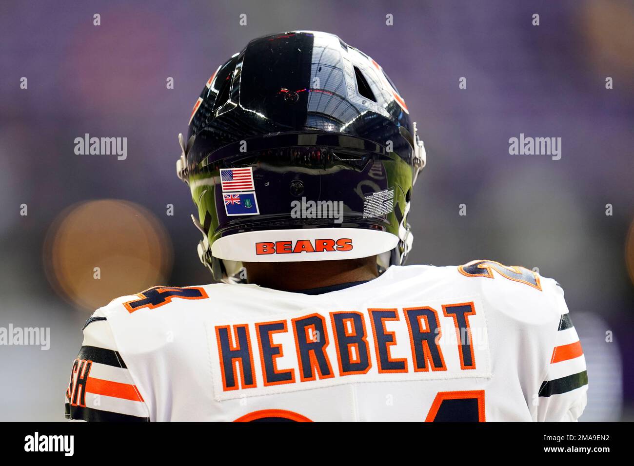 Flag decals are seen on the back of Chicago Bears running back Khalil ...