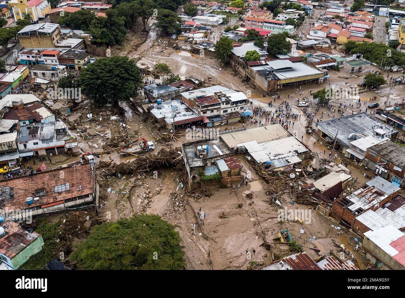 Streets are flooded after heavy rains caused a river to overflow in Las ...