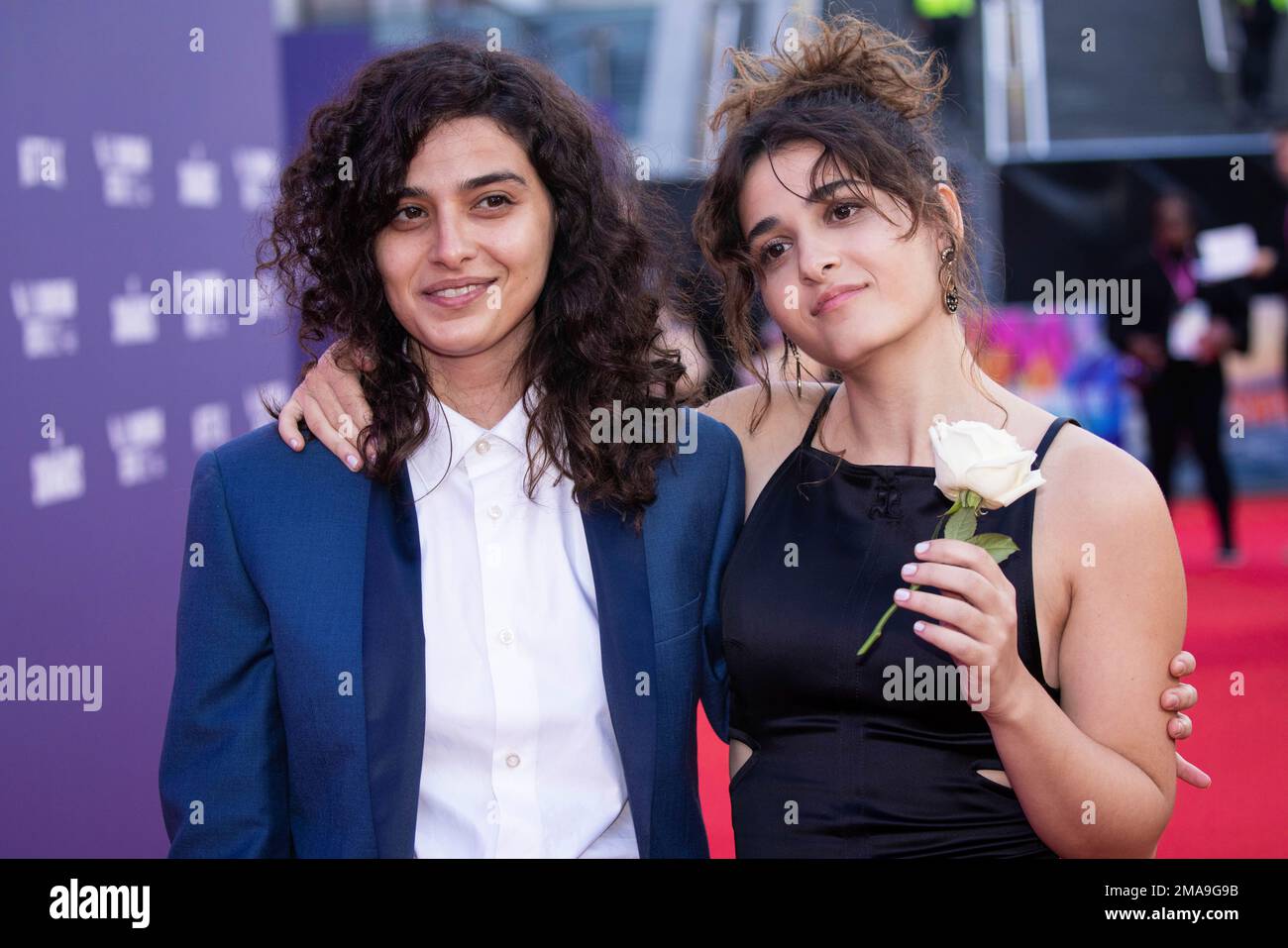 Manal Issa, left, and Nathalie Issa pose for photographers upon arrival ...