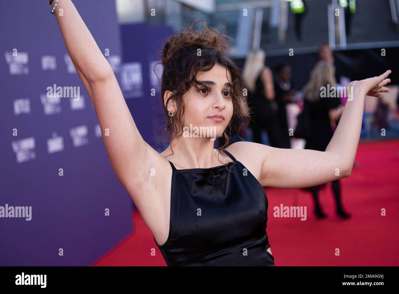 Nathalie Issa poses for photographers upon arrival for the premiere of ...