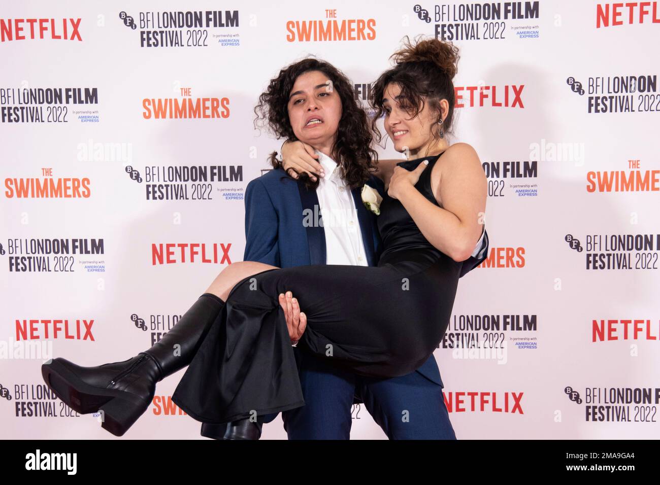 Manal Issa, left, and Nathalie Issa pose for photographers upon arrival ...