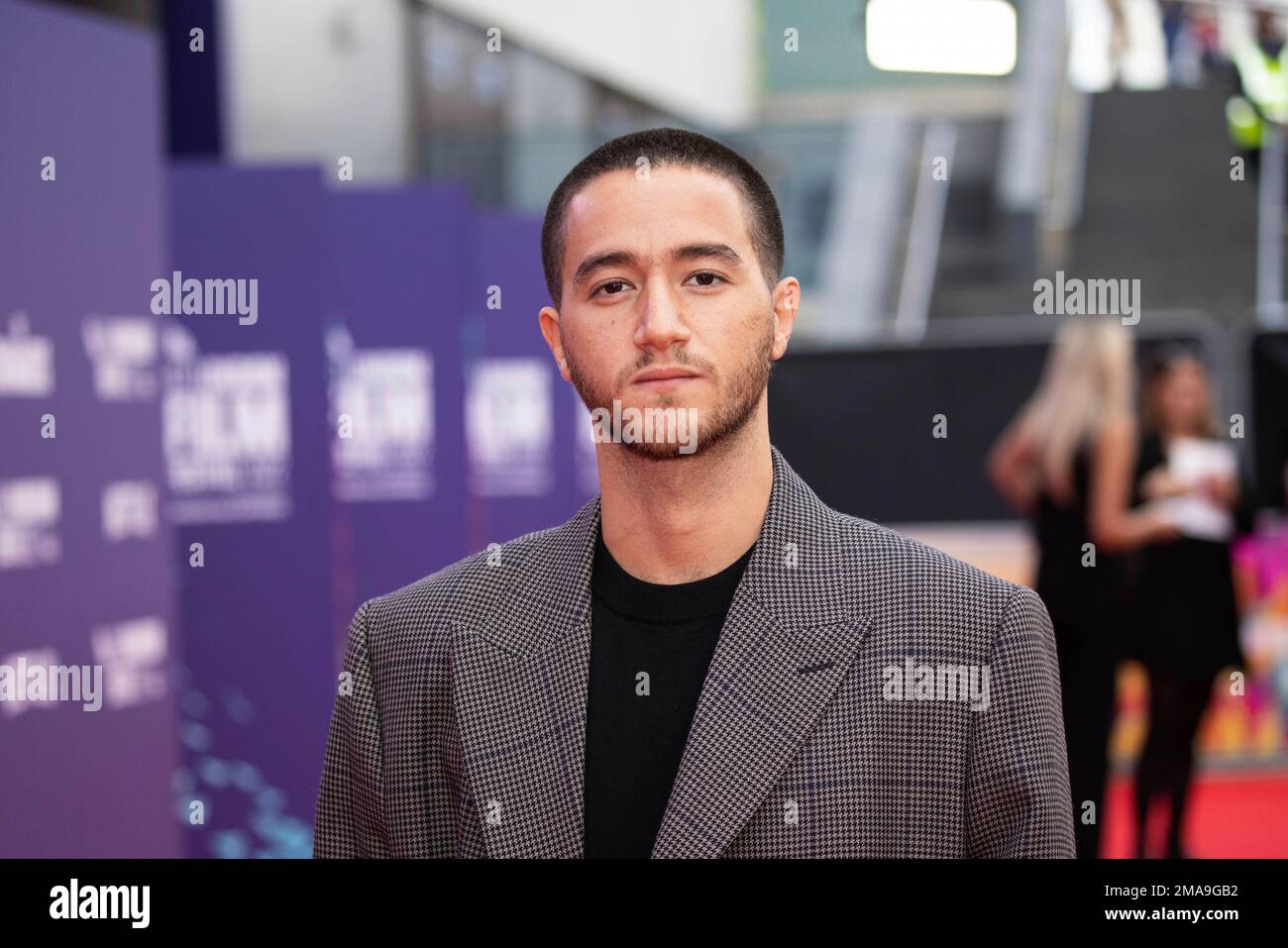 Ahmed Malek poses for photographers upon arrival for the premiere of ...