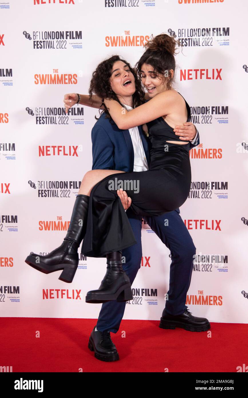 Manal Issa, left, and Nathalie Issa pose for photographers upon arrival ...