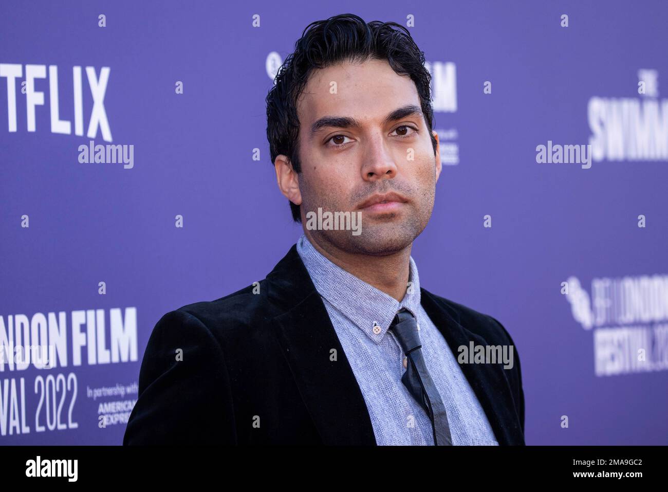 James Krishna Floyd poses for photographers upon arrival for the ...