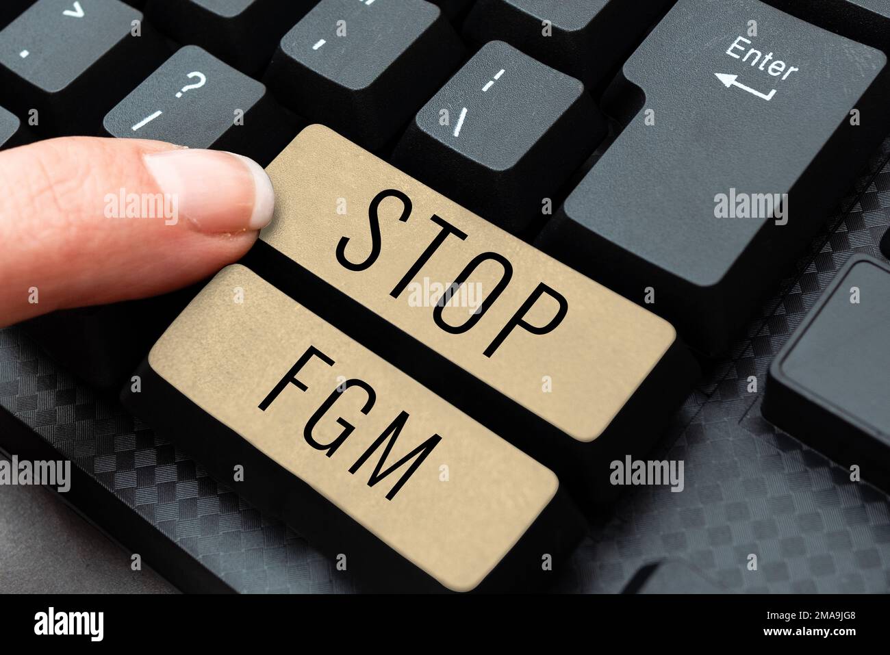 Hand writing sign Stop Fgm. Word Written on Put an end on female ...