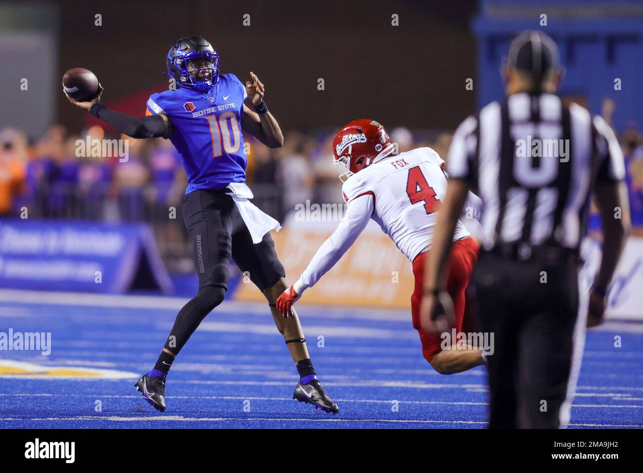 Boise State quarterback Taylen Green (10) looks to throw the ball under ...