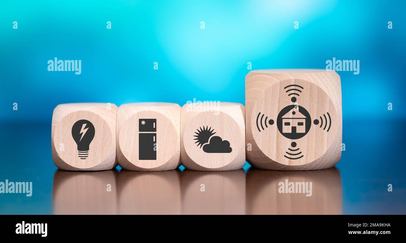 Wooden blocks with symbol of smart home concept on blue background ...