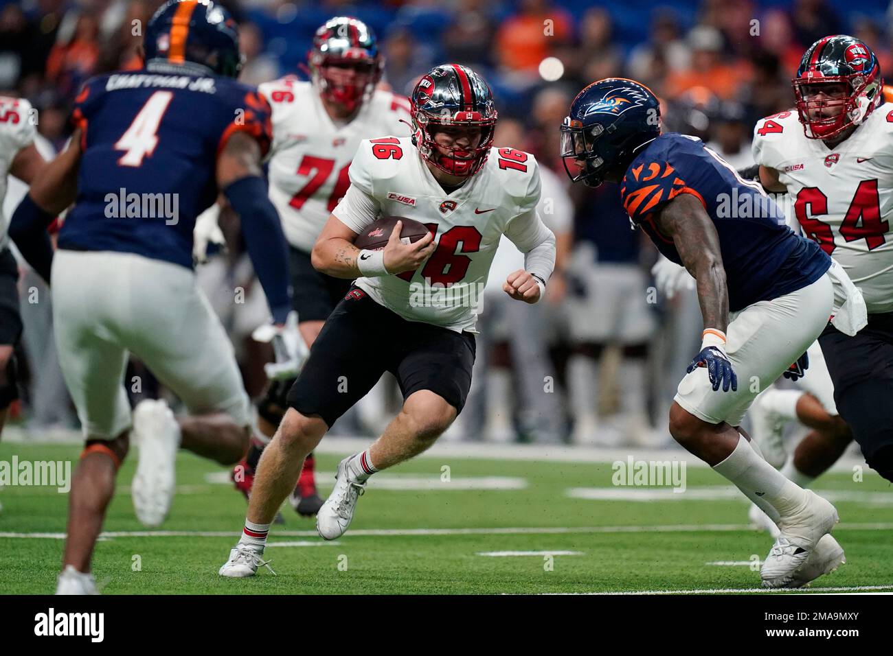 Western Kentucky quarterback Austin Reed (16) runs against UTSA during ...