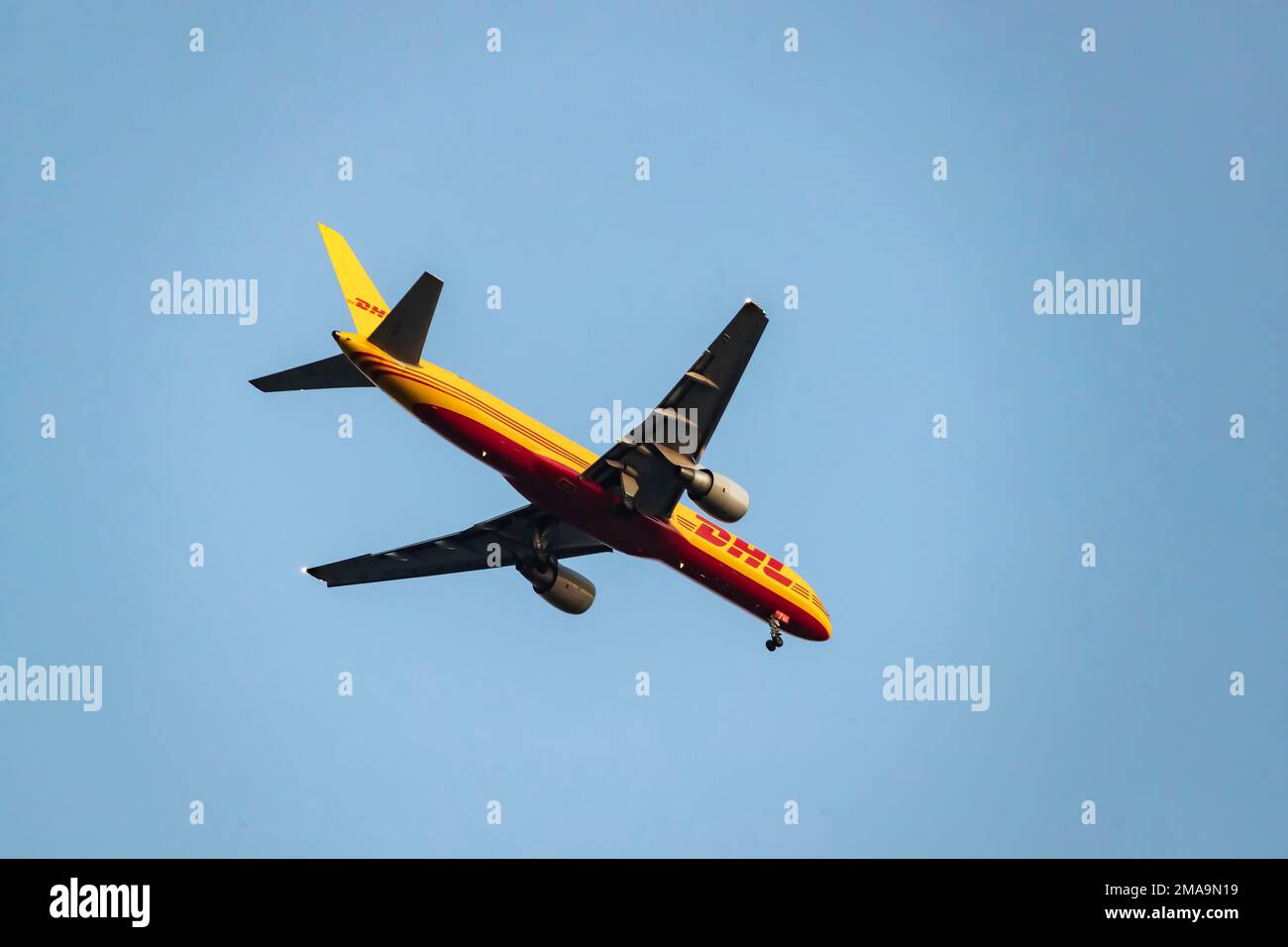 DHL Boeing 757-200F plane flying overhead approaching Lisbon, Portugal ...