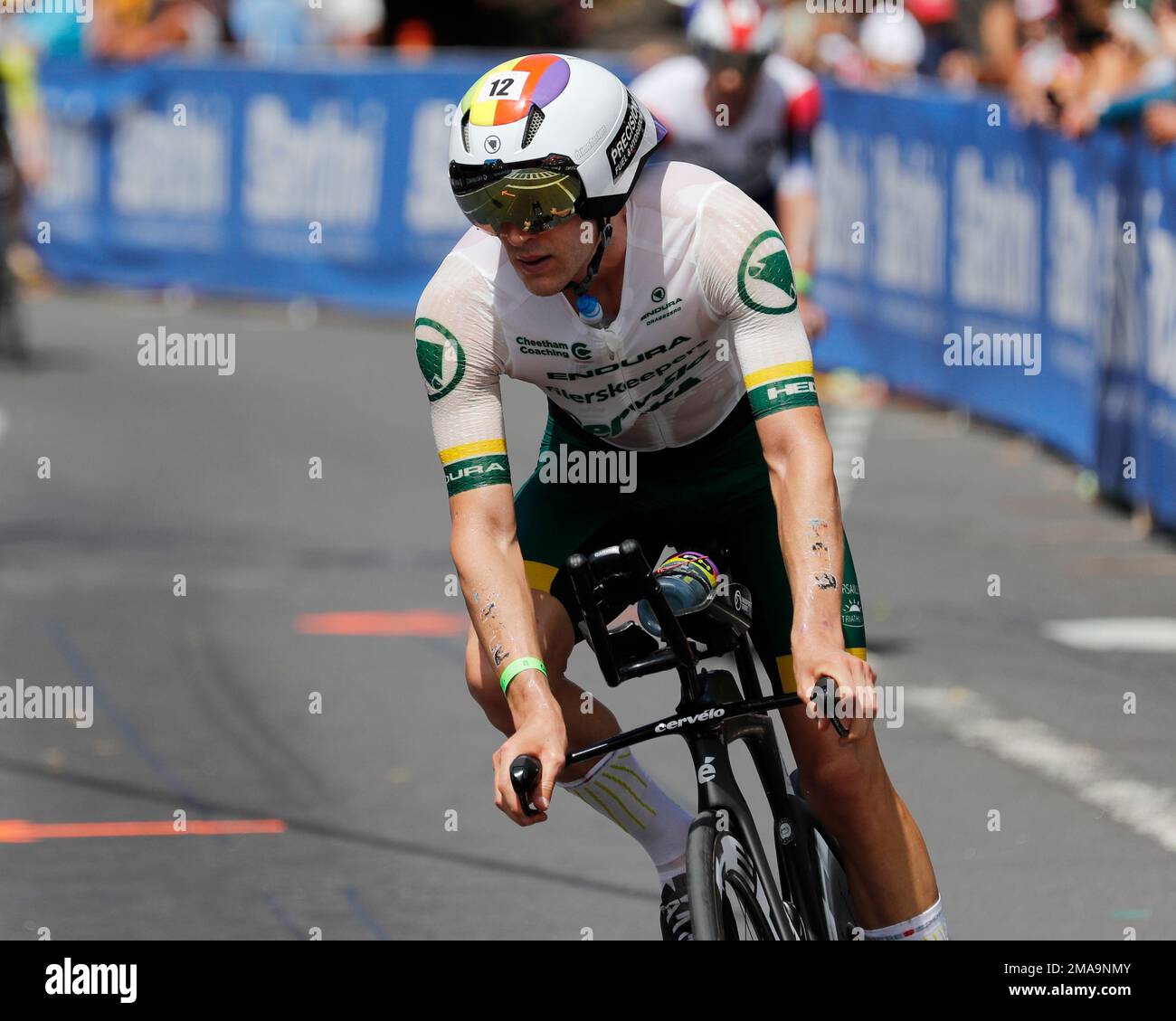 Leon Chevalier, of France, rides into the transition area at the end of ...