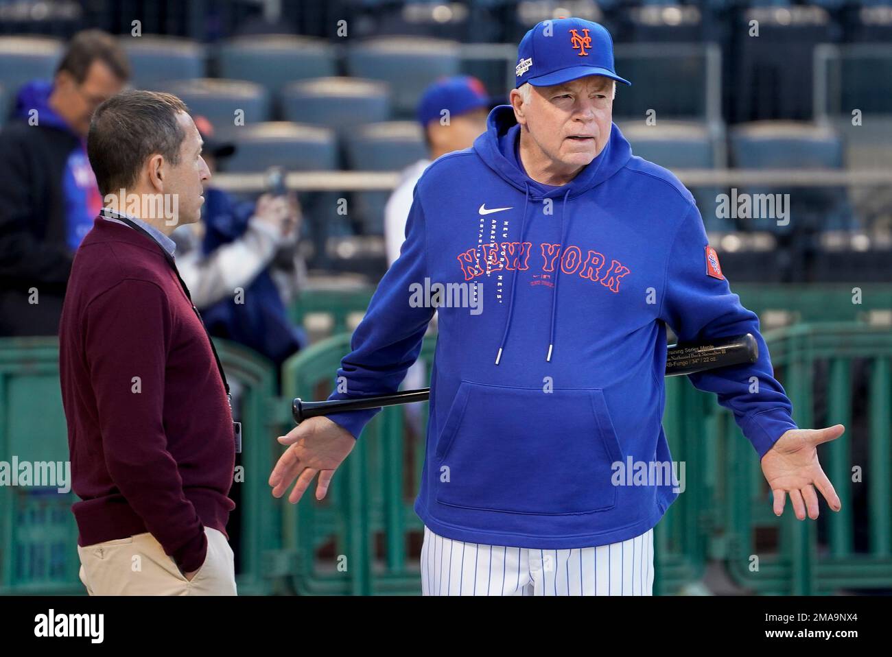 New York Mets manager Buck Showalter talks on the field before Game 2 ...