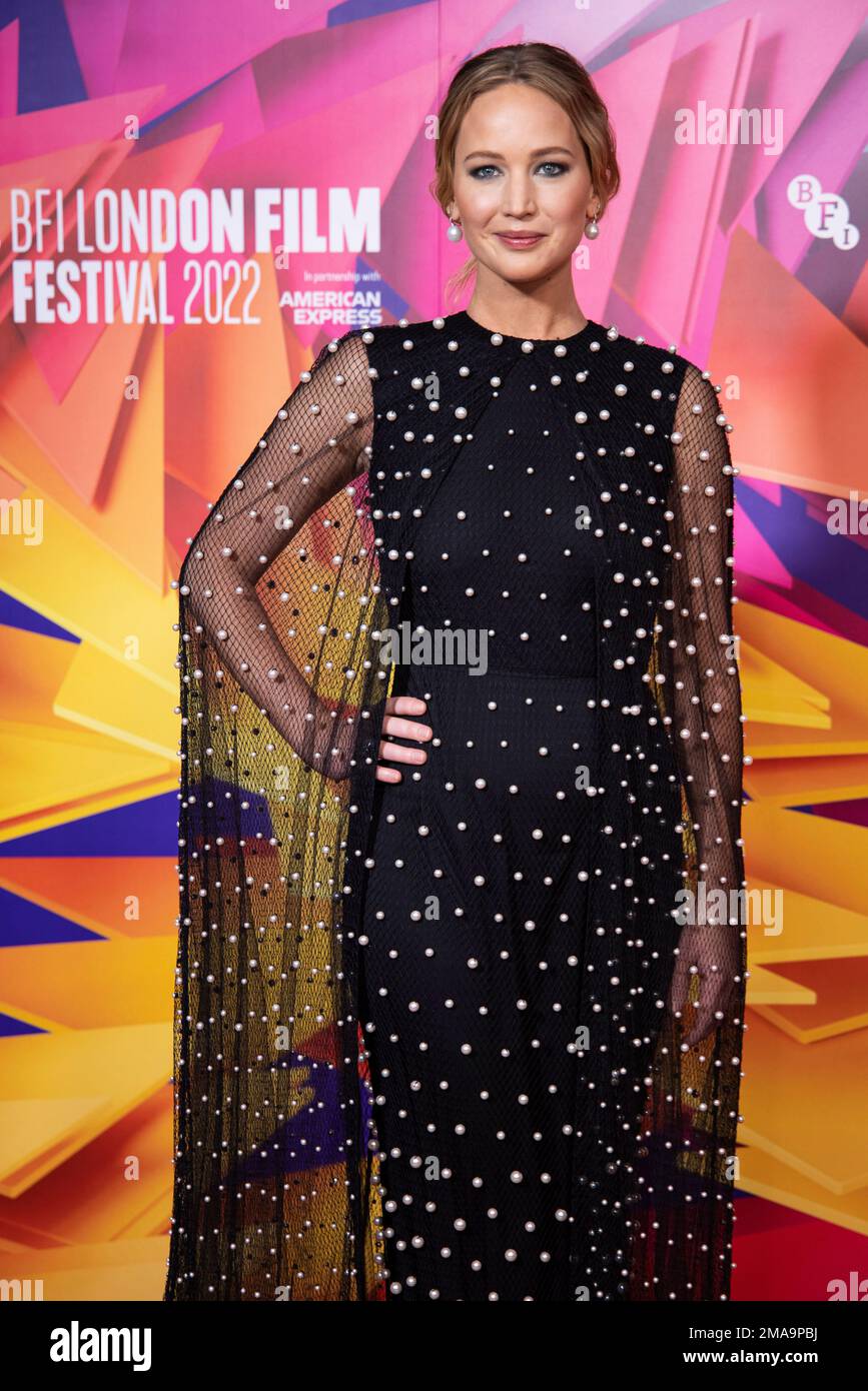 Jennifer Lawrence poses for photographers upon arrival for the premiere ...