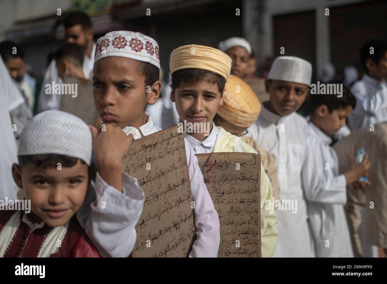 Boys from local religious schools take part in a parade celebrating the ...