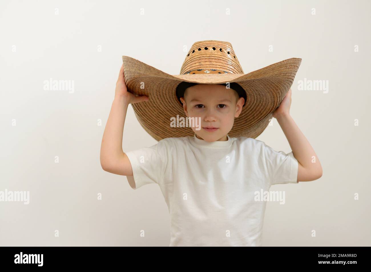 Little boy with a hat doing push-ups. Cowboy hat Cute Little Cowboy on ...
