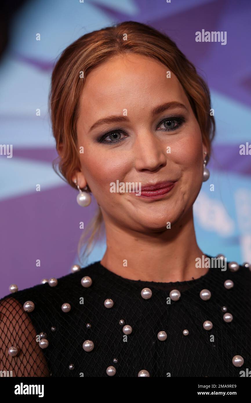 Jennifer Lawrence poses for photographers upon arrival for the premiere ...