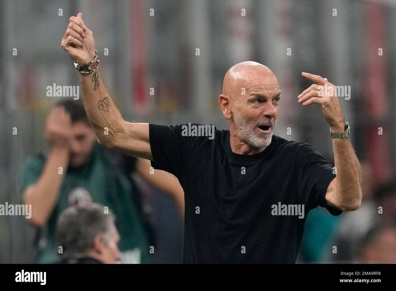 AC Milan's manager Stefano Pioli celebrates at the end of the Serie A ...