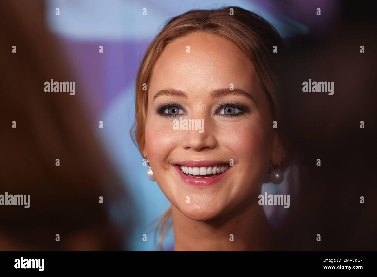 Jennifer Lawrence is interviewed upon arrival for the premiere of the ...