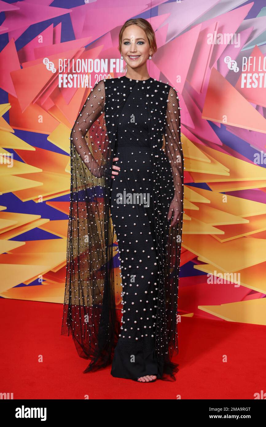 Jennifer Lawrence poses for photographers upon arrival for the premiere ...