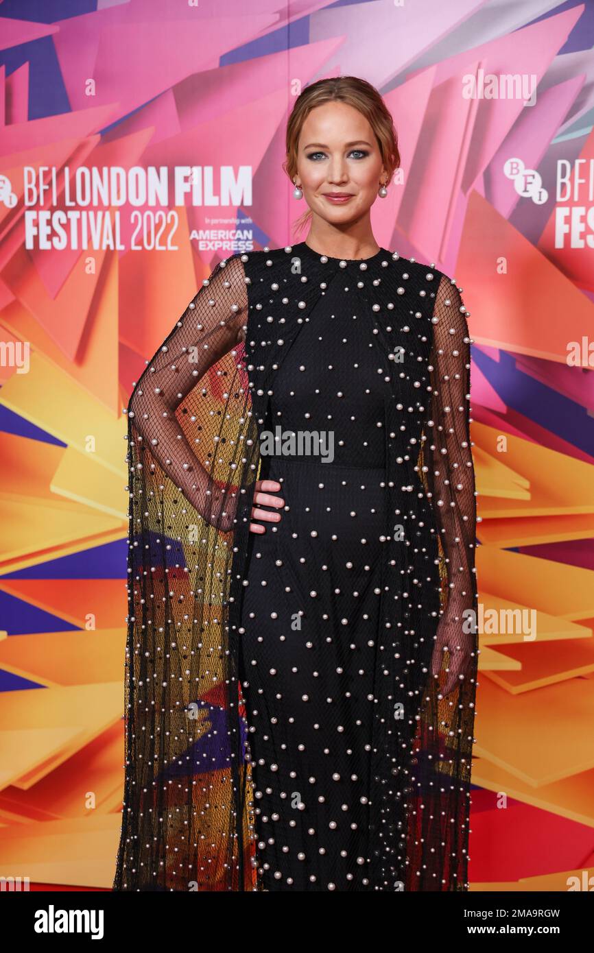 Jennifer Lawrence poses for photographers upon arrival for the premiere ...