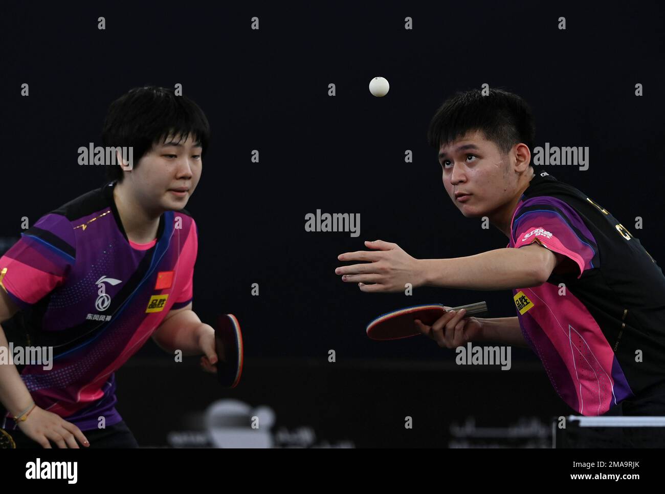 Doha, Qatar. 19th Jan, 2023. Kuai Man/Lin Shidong (R) compete during ...