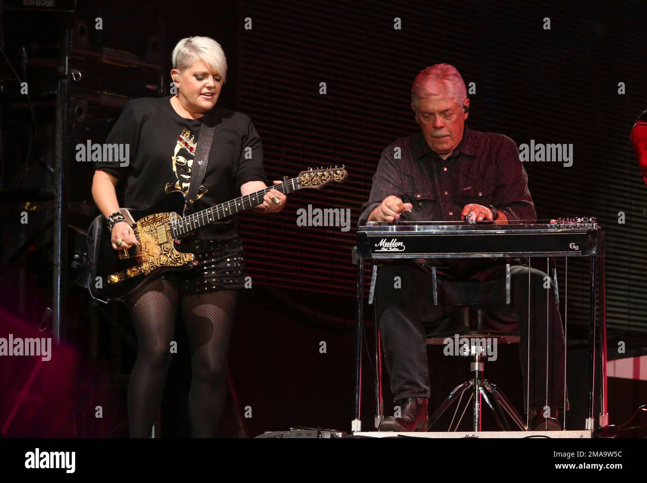 The Chicks' Natalie Maines, left, and her father, Lloyd Maines, perform ...