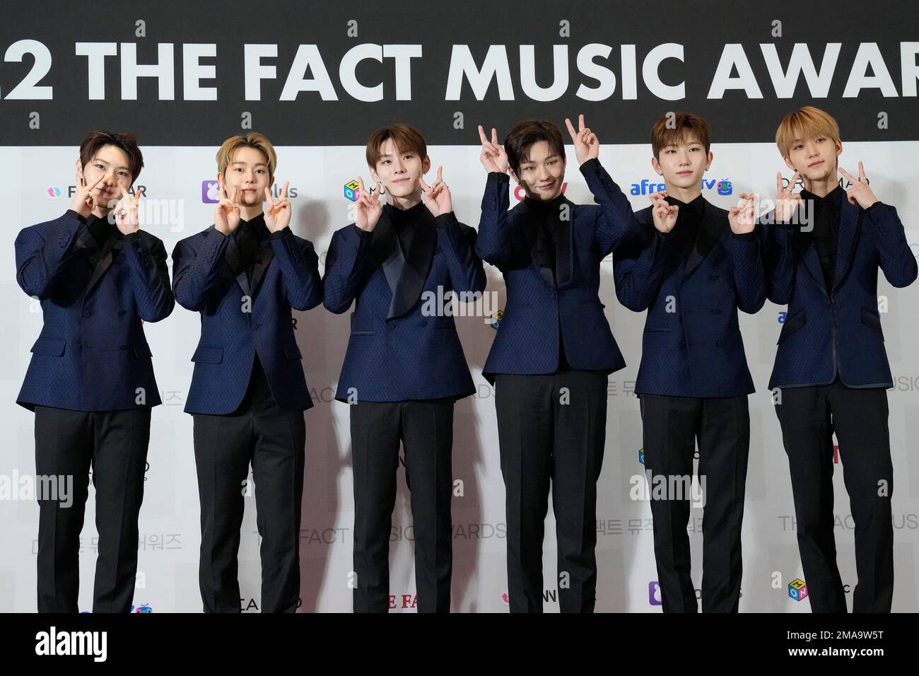 K-Pop boy group TNX pose for photos during the red carpet of 2022 The Fact Music Awards in Seoul ...