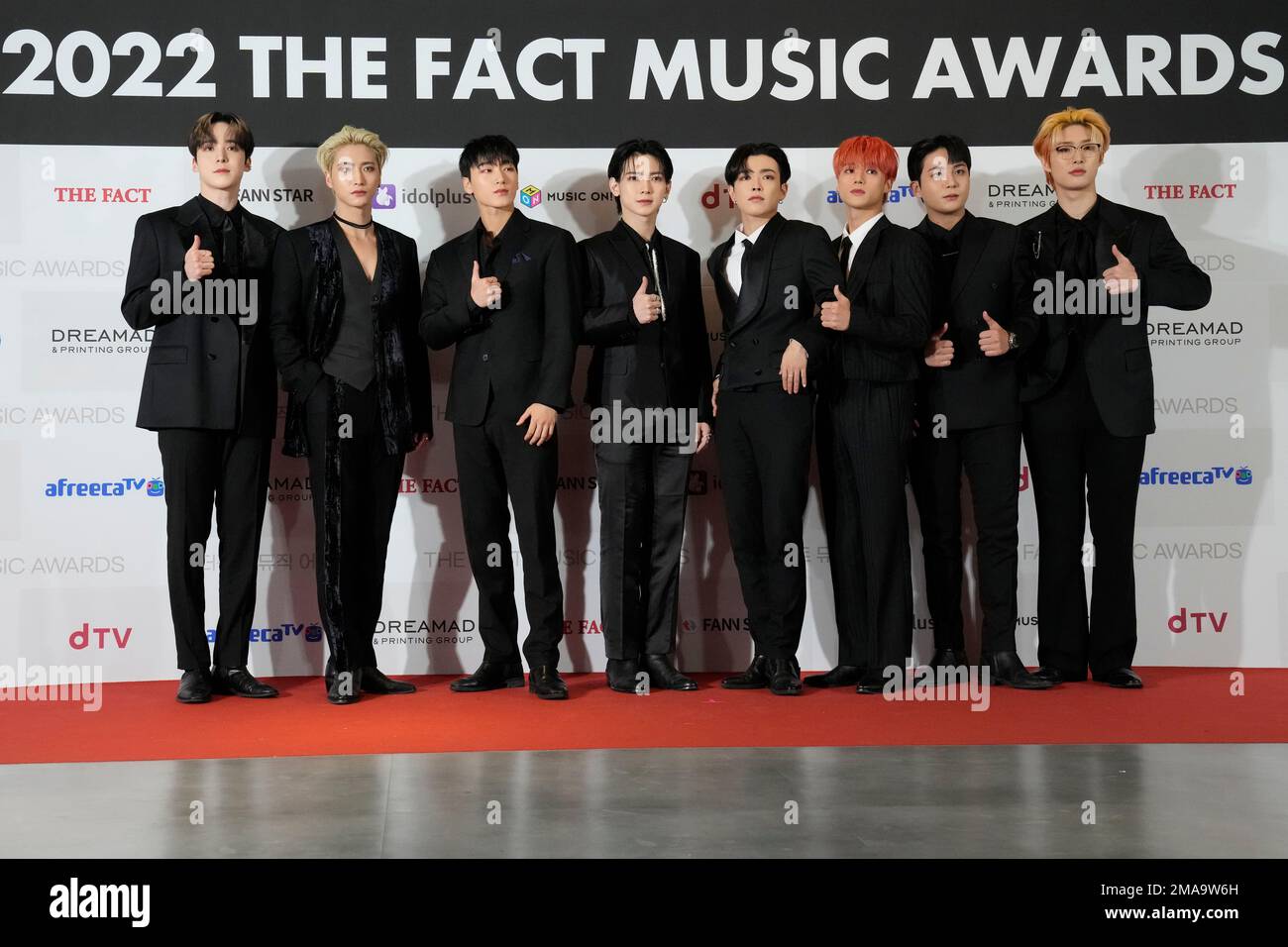 K-Pop boy group ATEEZ pose for photos during the red carpet of 2022 The Fact Music Awards in ...