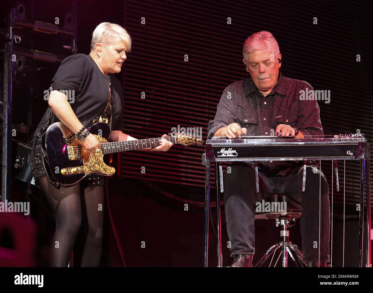 The Chicks' Natalie Maines, left, and her father, Lloyd Maines, perform ...