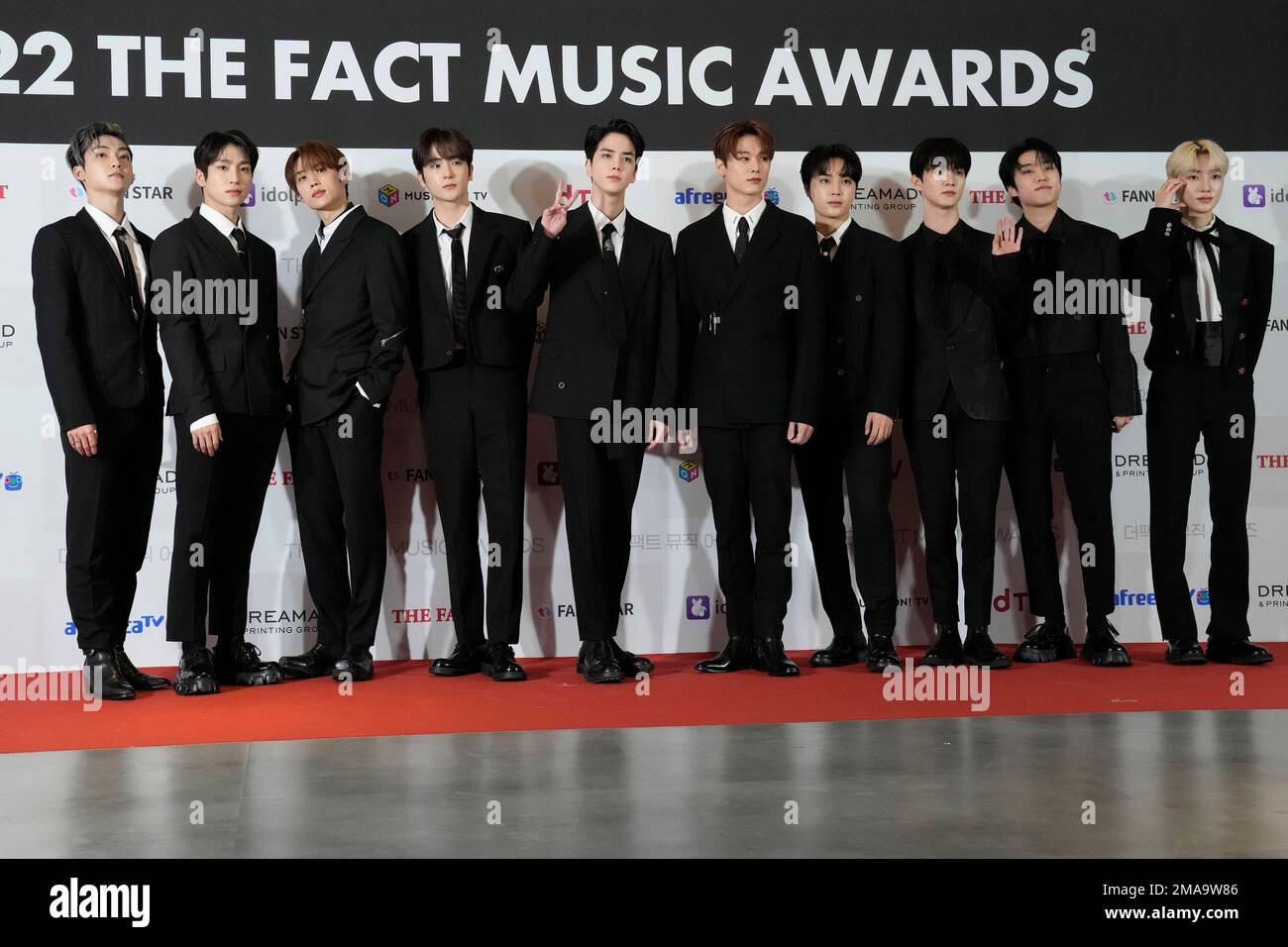 K-Pop boy group The Boyz pose for photos during the red carpet of 2022 The Fact Music Awards in ...