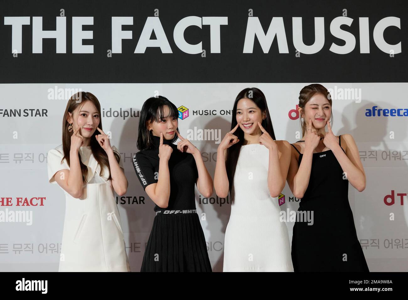 K-Pop girl group LE SSERAFIM pose for photos during the red carpet of 2022 The Fact Music Awards ...