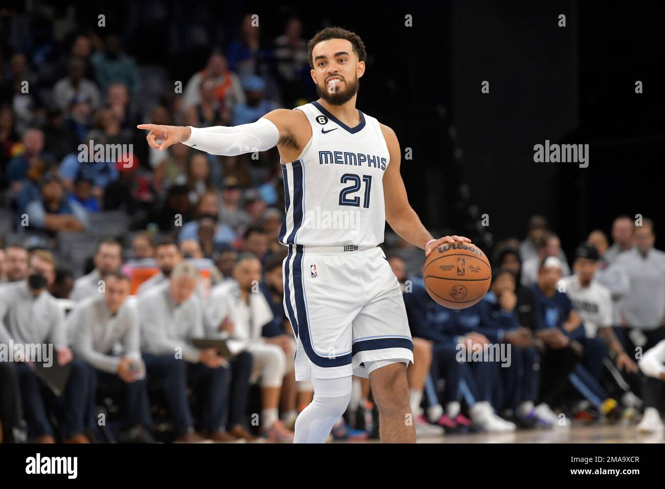 Memphis Grizzlies guard Tyus Jones (21) calls to teammates in the ...