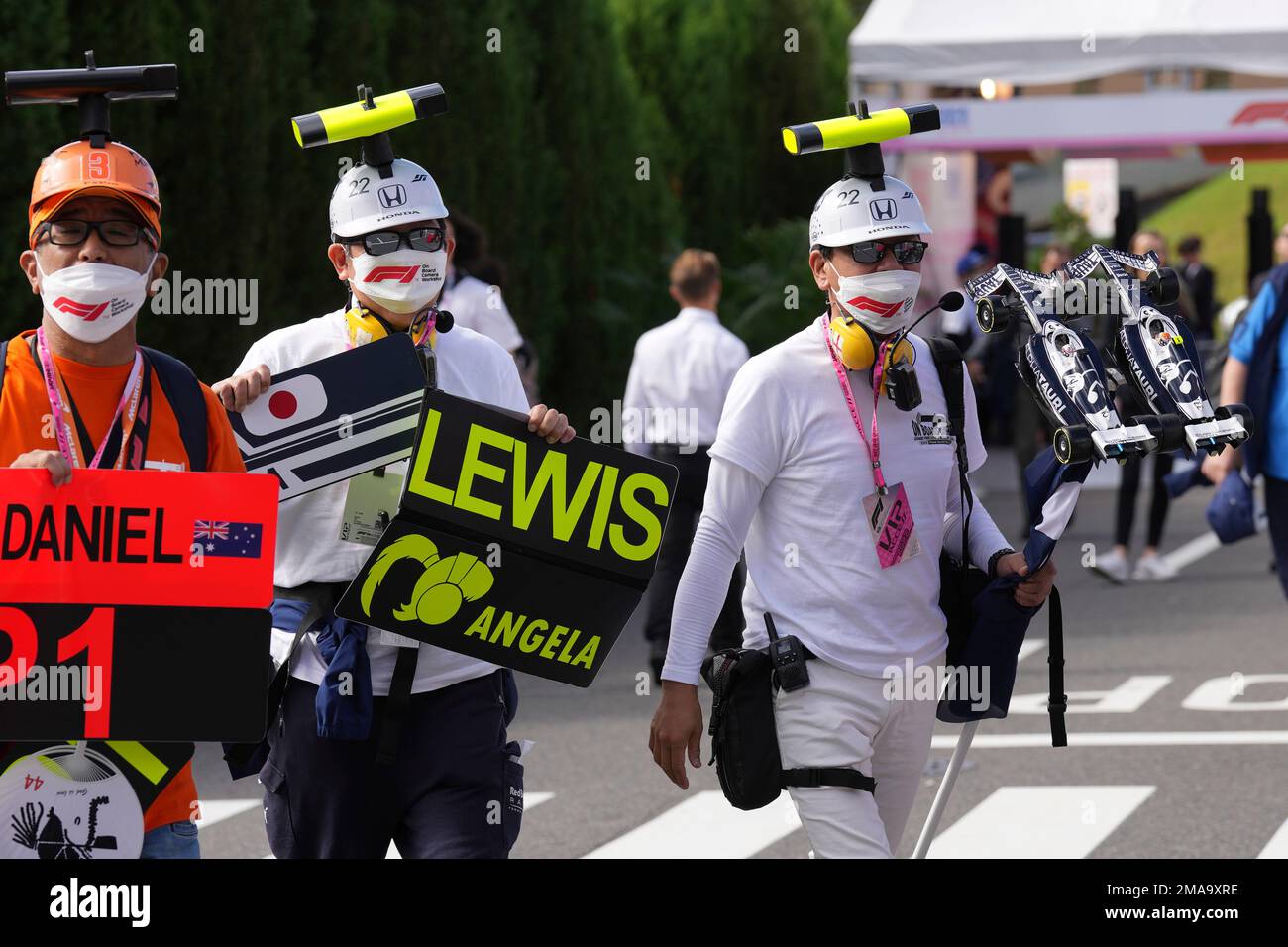 Fans walk at the paddock prior to the third practice session at the ...