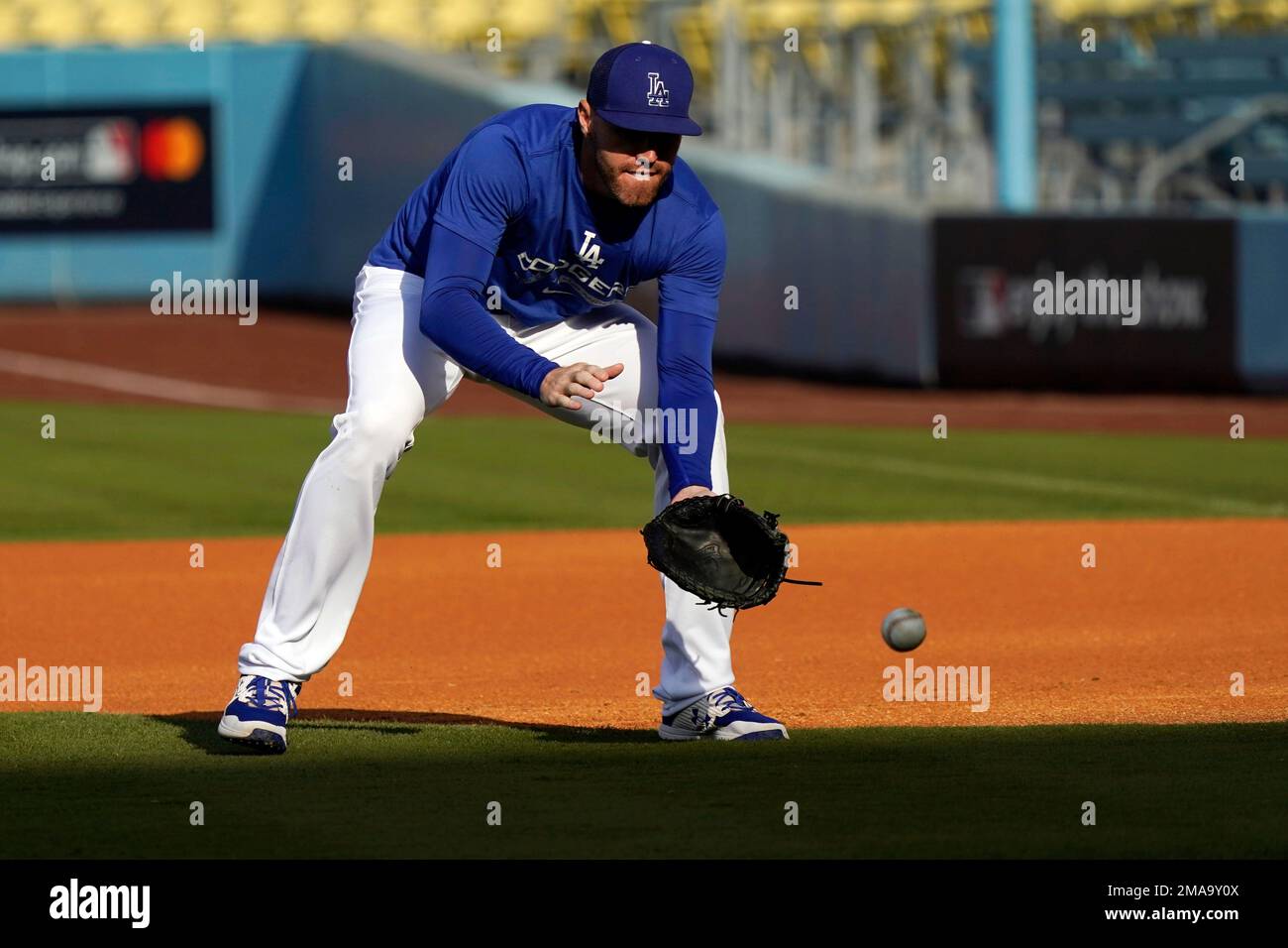 Los Angeles Dodgers first baseman Freddie Freeman fields ground balls ...