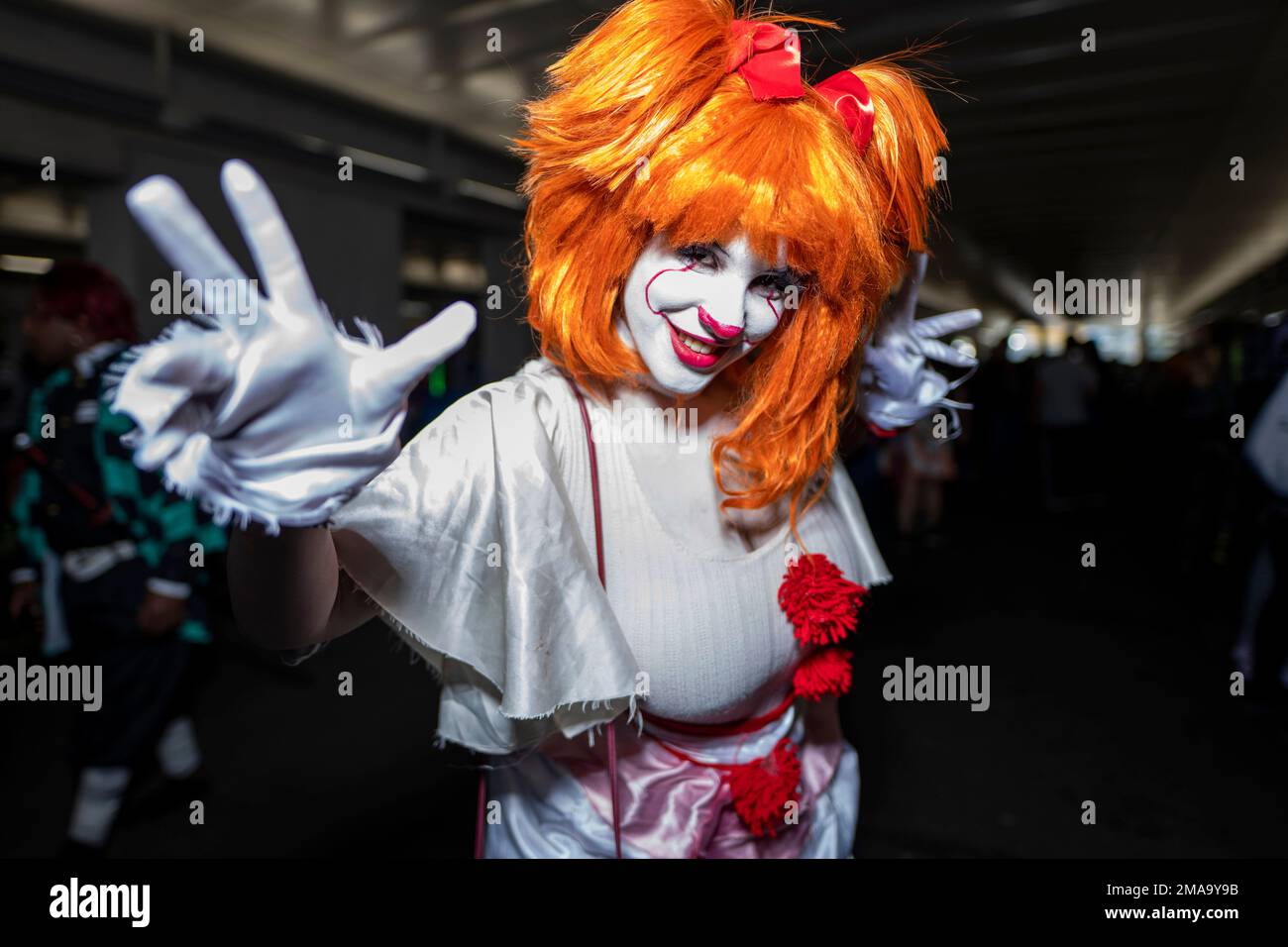 An attendee dressed as Pennywise poses during New York Comic Con at the ...
