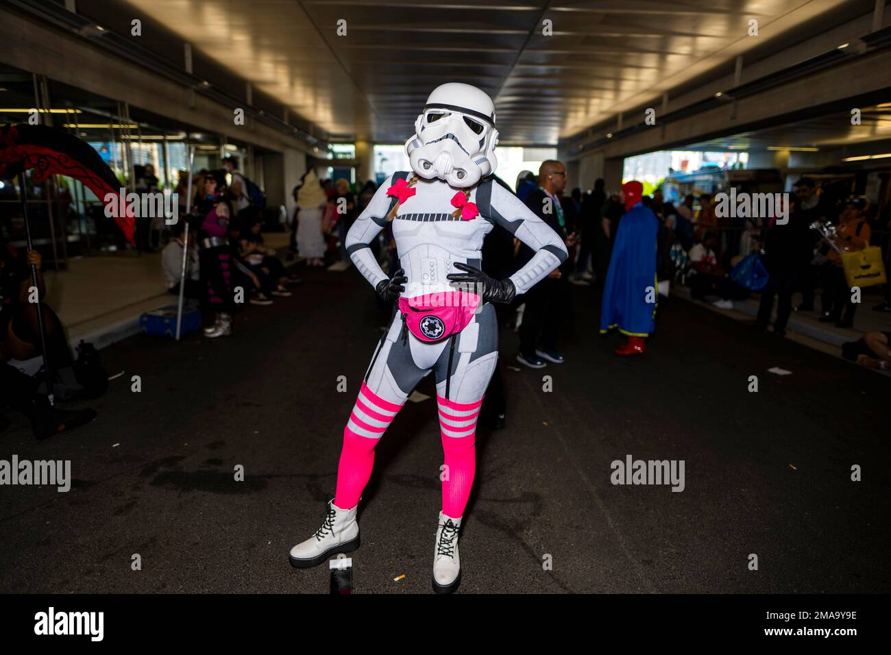 An attendee dressed as a Stormtrooper from "Star Wars" poses during New ...