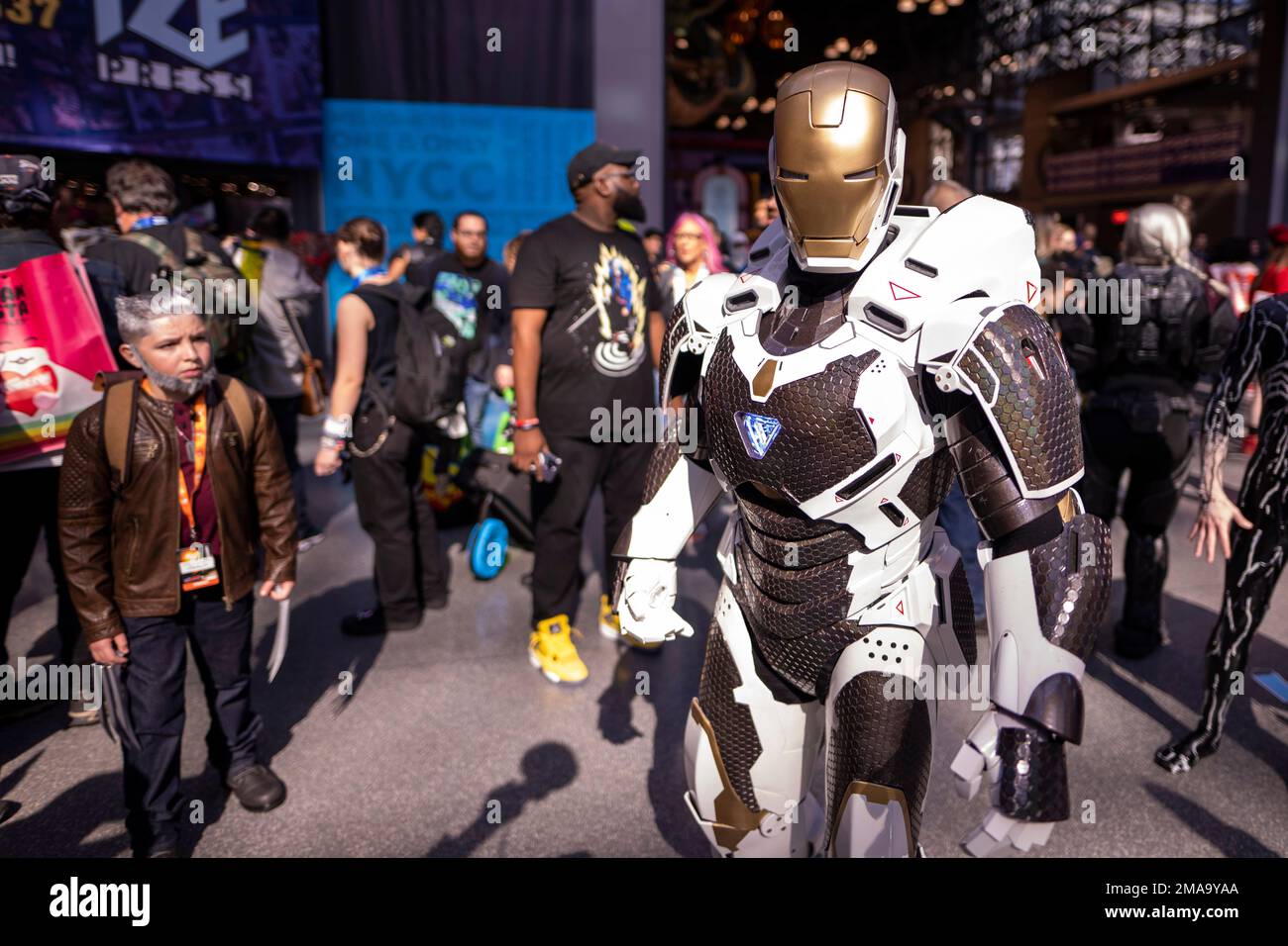 An attendee dressed as Iron Man poses during New York Comic Con at the ...