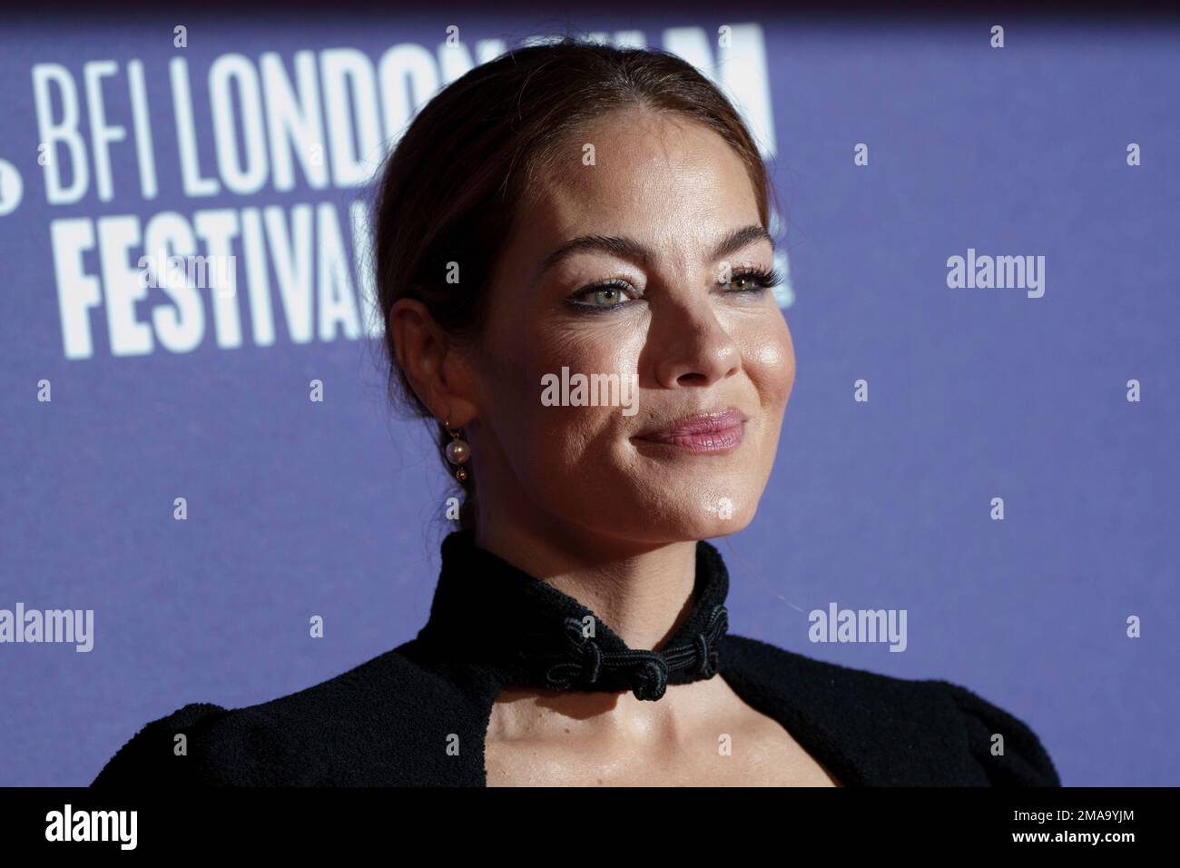 Michelle Monaghan poses for photographers upon arrival for the premiere ...