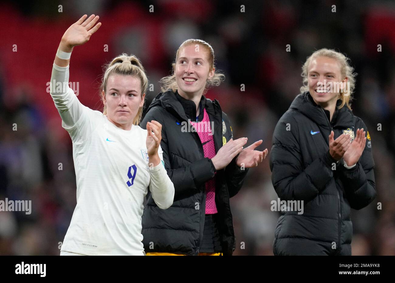 England's Lauren Hemp, left, waves to supporters after the women's ...