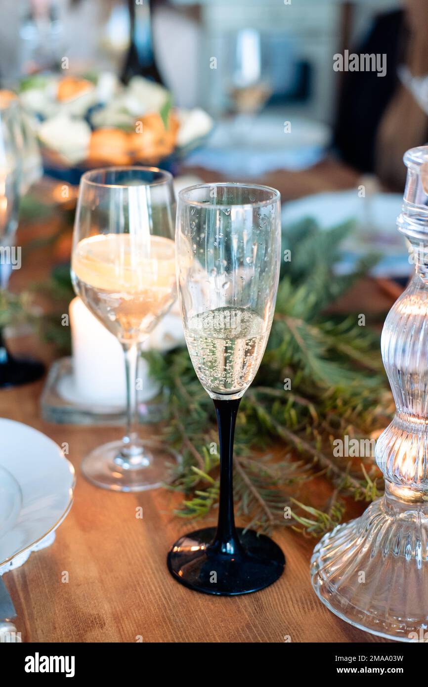two glasses with alcohol on the New Year's table. glass of champagne ...