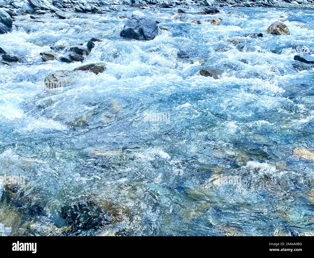 A high angle shot of splashing water in a rocky river Stock Photo - Alamy