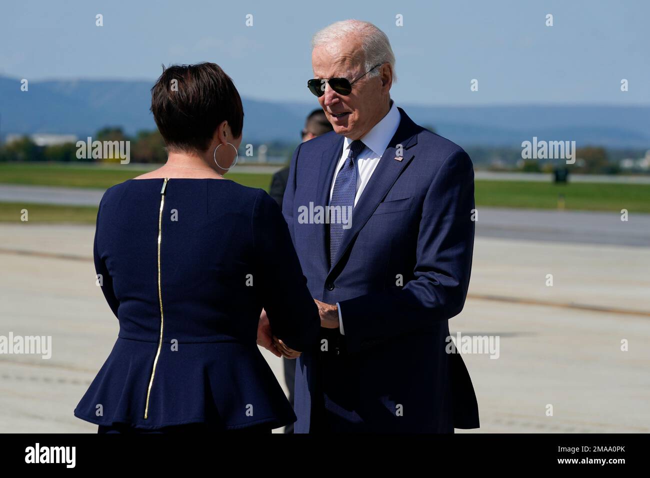 President Joe Biden greets Hagerstown Mayor Emily Keller as he arrives ...