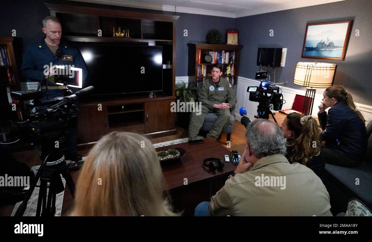 US Navy Rear Admiral Greg Huffman, seated center, answer questions from ...