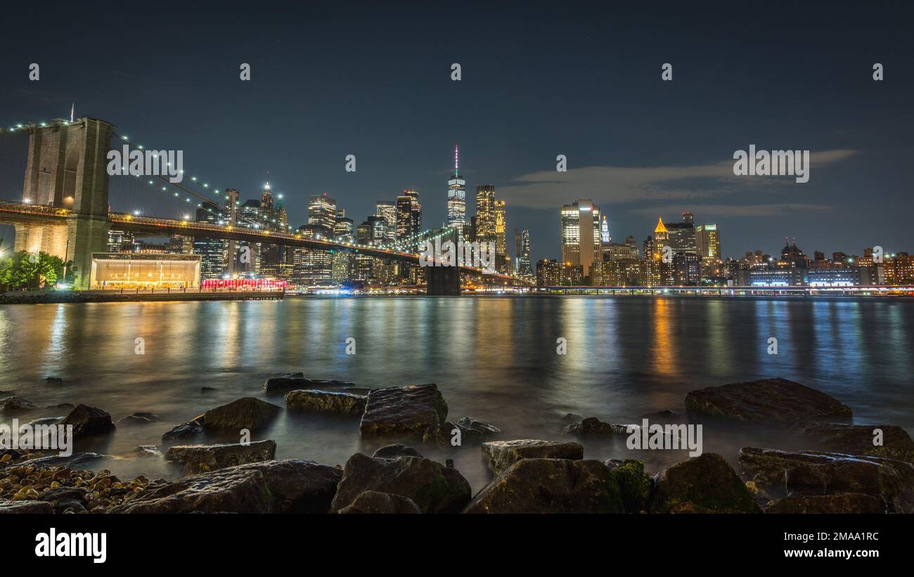 Classic view of Brooklyn Bridge and Manhattan from Pebble Beach in ...