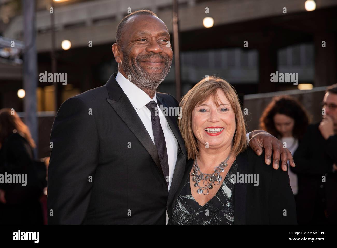 Sir Lenny Henry and Lisa Makin pose for photographers upon arrival for ...