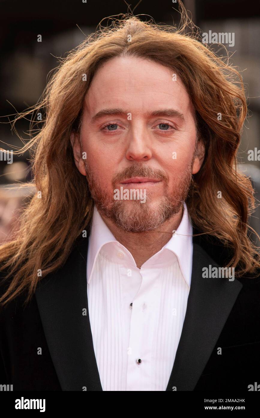 Tim Minchin poses for photographers upon arrival for the premiere of ...