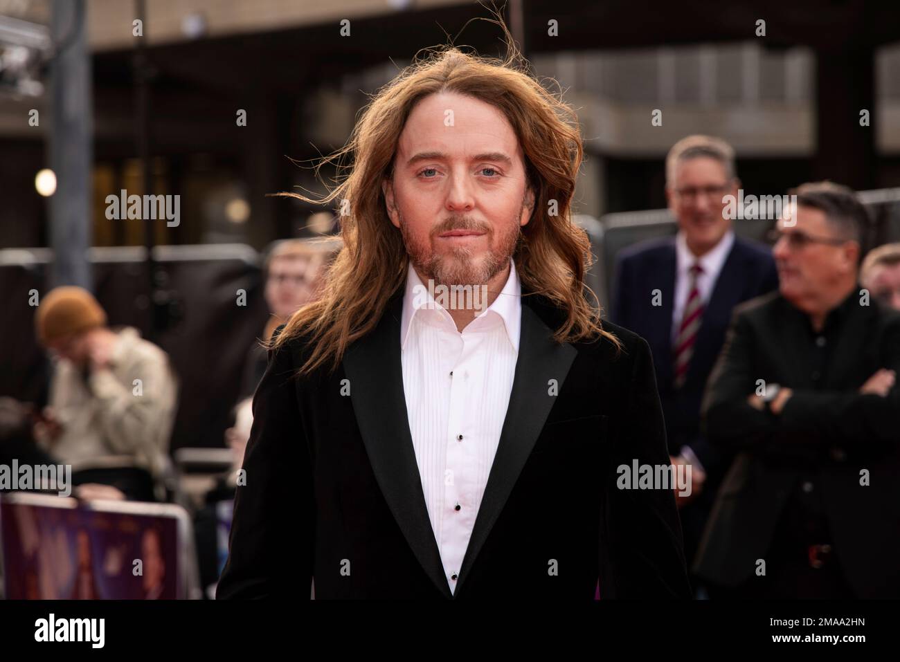 Tim Minchin poses for photographers upon arrival for the premiere of ...