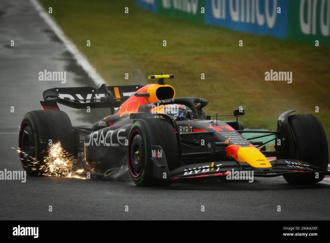 Red Bull driver Sergio Perez of Mexico powers his car during second practice session for the ...