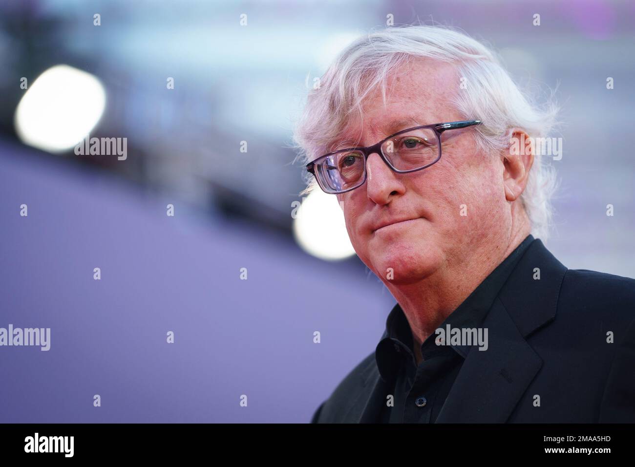 Uri Singer poses for photographers upon arrival for the premiere of the ...